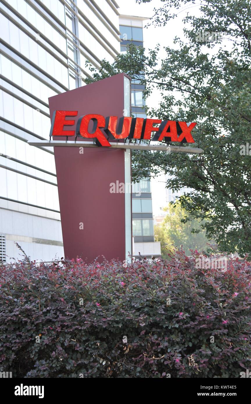 Sign with logo and a portion of the main building are visible at the ...