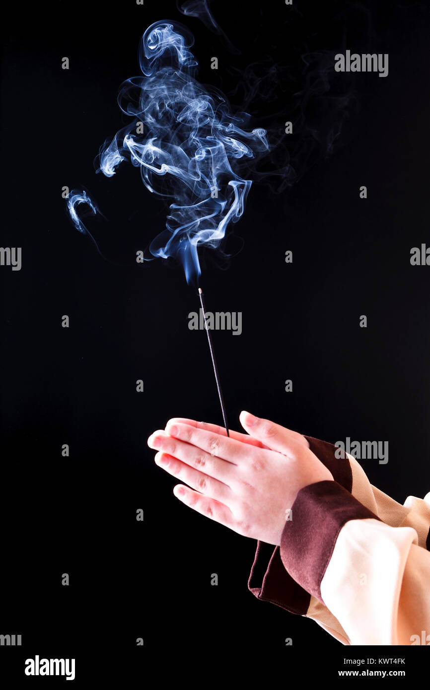 Lit incense hi-res stock photography and images - Alamy