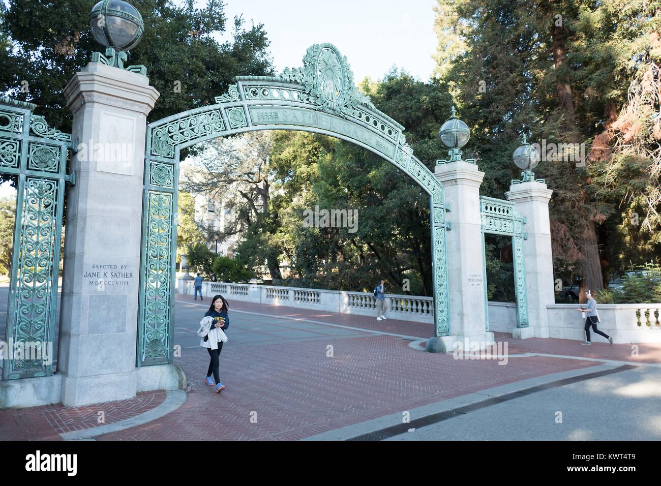 A female college student walks through Sather Gate on the campus of UC ...