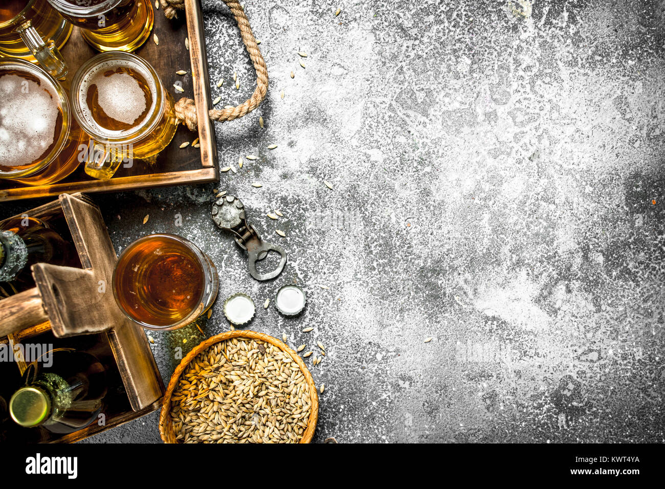 Beer background. Fresh beer with ingredients. On a rustic background ...