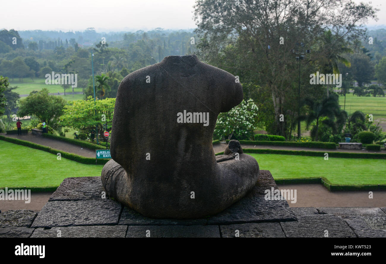 A Buddha statue of Borobudur Temple in Java Island, Indonesia ...