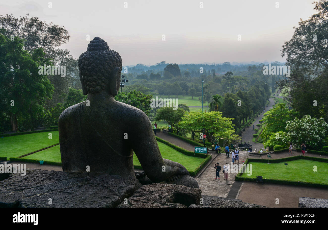 A Buddha statue of Borobudur Temple in Java Island, Indonesia ...