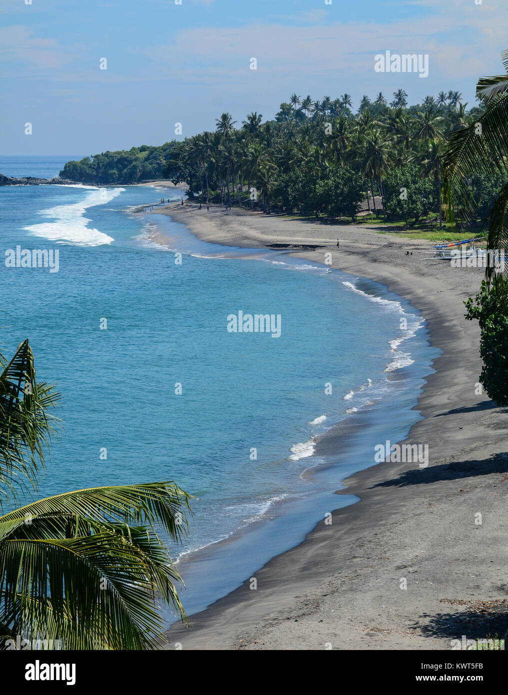 Black sand beach of Lombok Island, Indonesia. Lombok is an island in ...