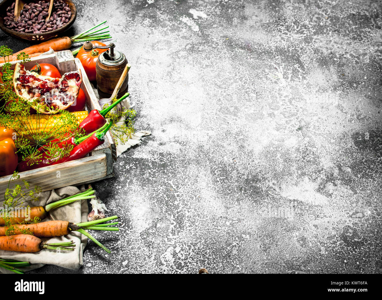 Organic food. Fresh harvest of vegetables and fruits. On a rustic ...