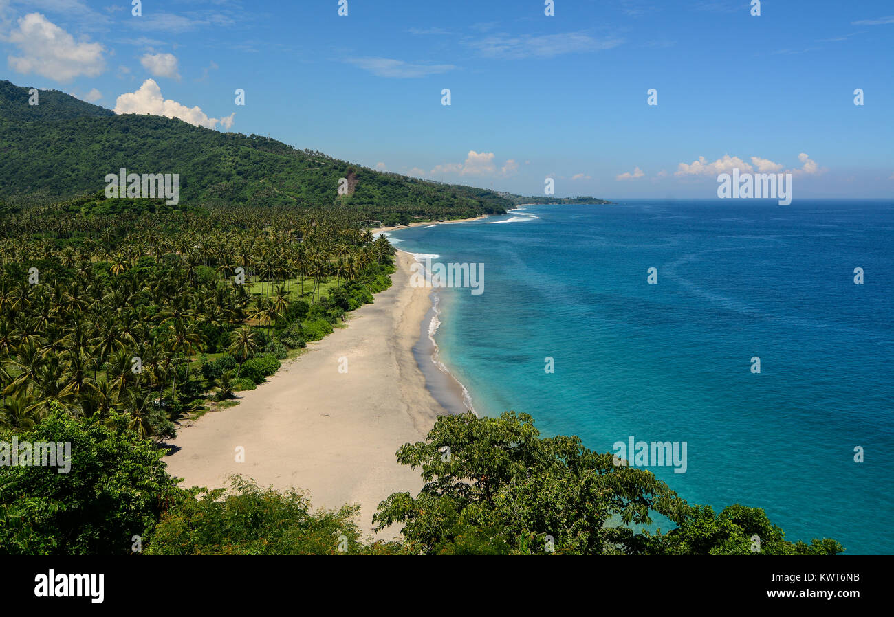 Sand beach and blue sea of Lombok Island, Indonesia. Lombok has lots of ...