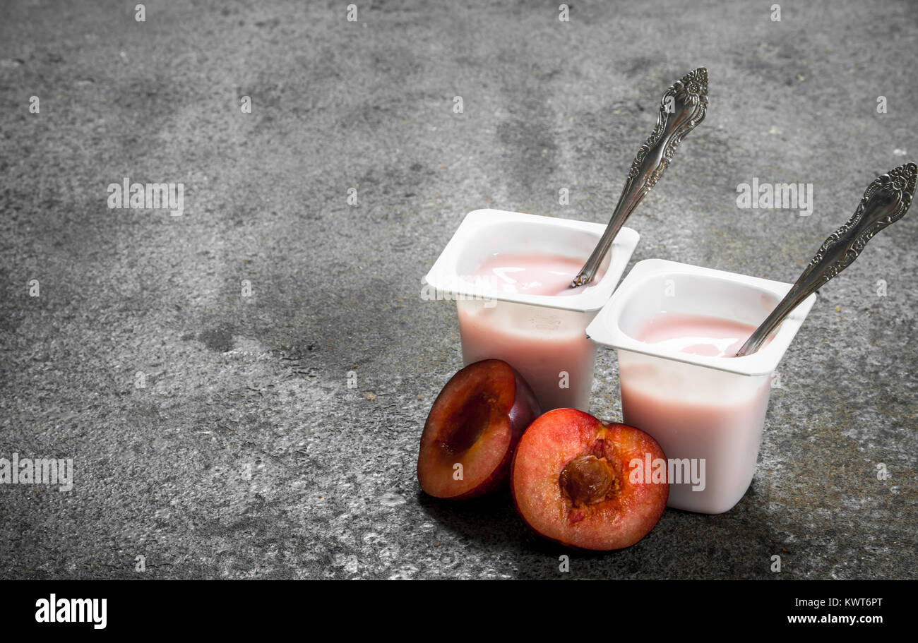 Natural yogurt in a bowl. On a rustic background Stock Photo - Alamy