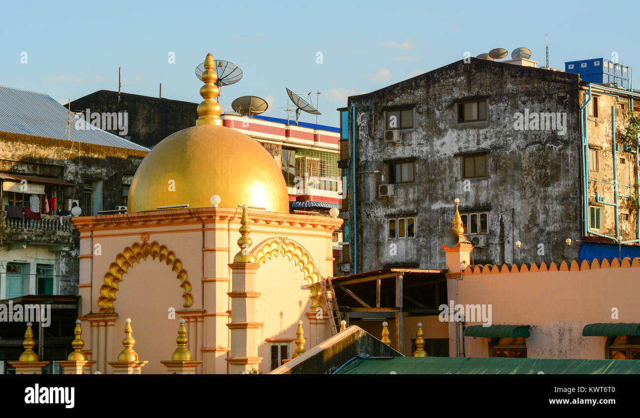Yangon, Myanmar - Jan 14, 2015. Old buildings with golden dome in ...