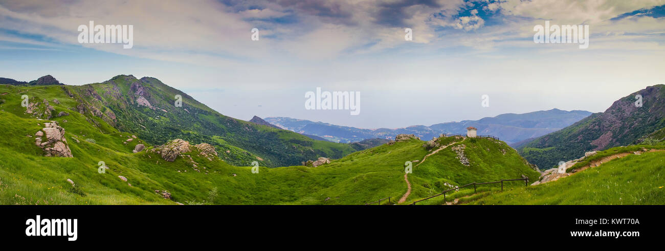 Alpine landscape with small soldiers monument facing the Mediteranean ...