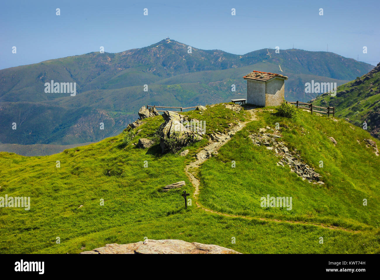 Alpine landscape with small soldiers monument facing the Mediteranean ...