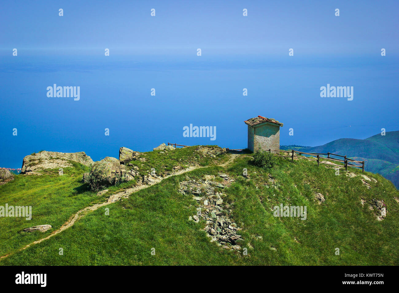 Alpine landscape with small soldiers monument facing the Mediteranean ...