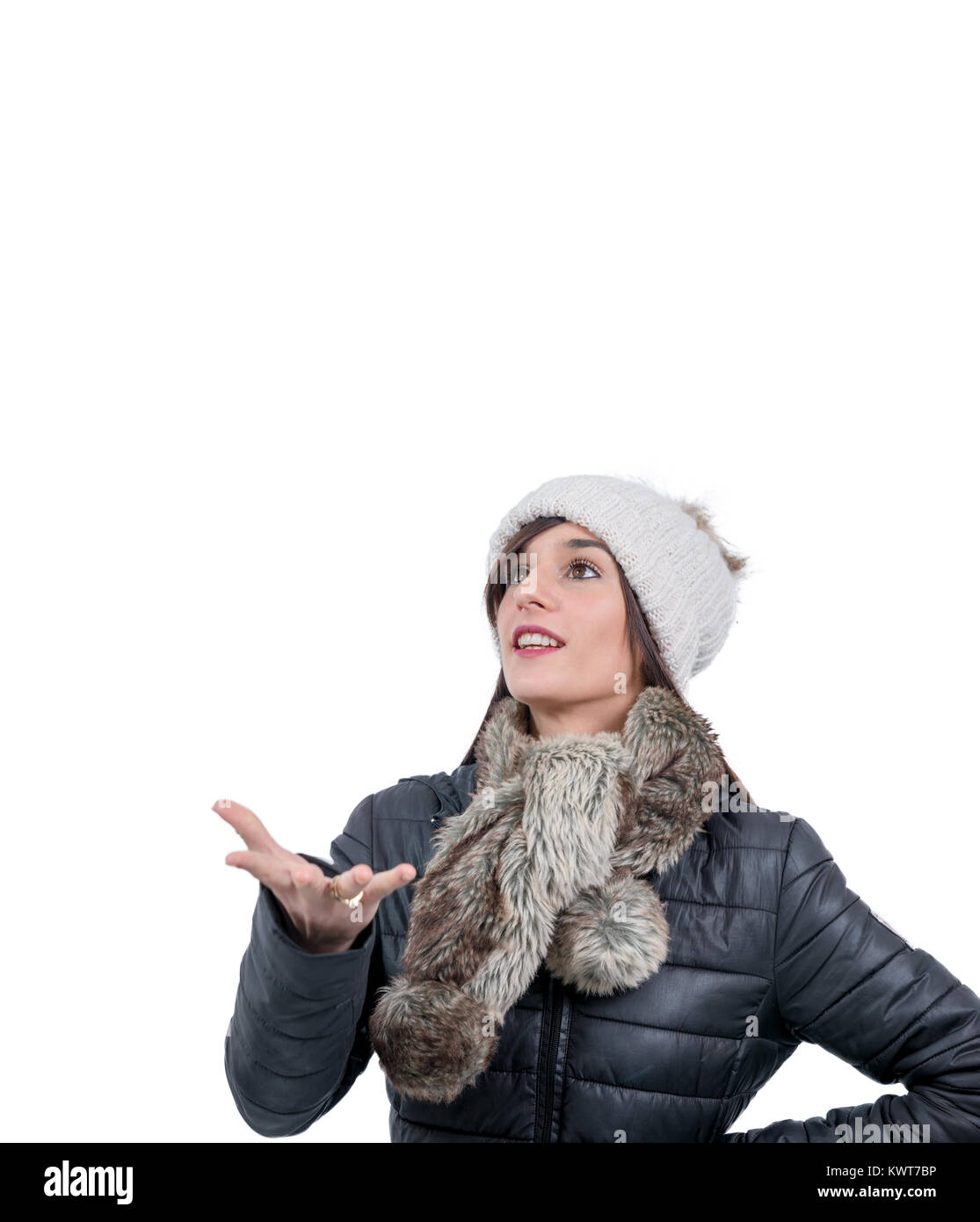 A woman throwing something in the air, isolated on the white background ...