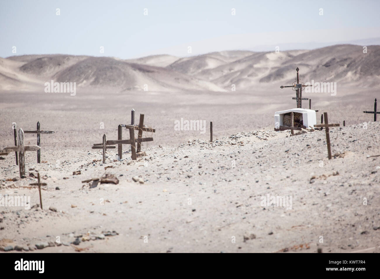A cemetery at the outskirts of a small village in the Nazca desert ...