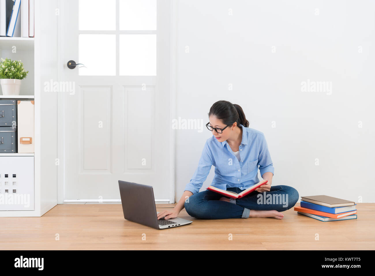 young girl student using computer searching education information and ...