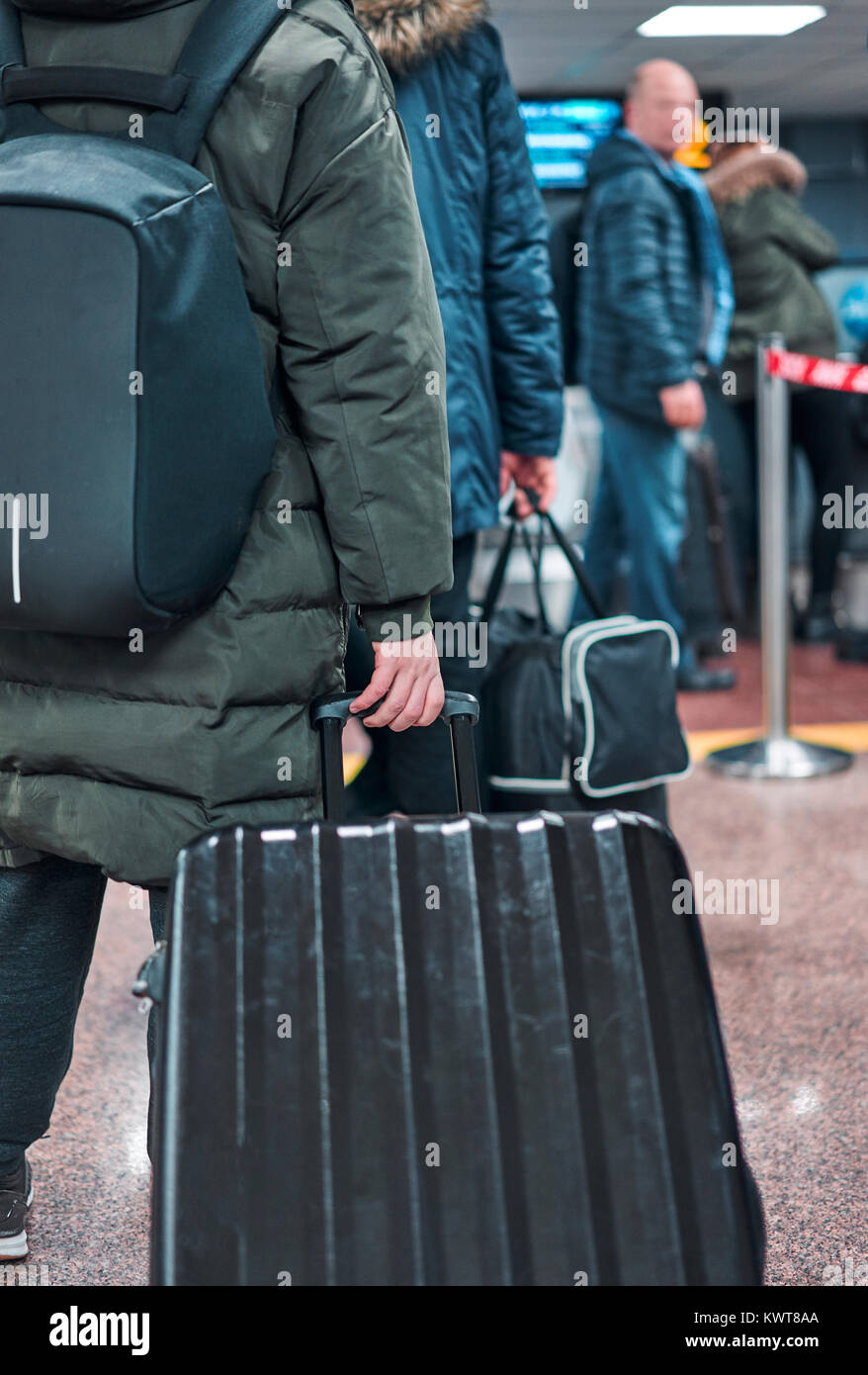 man with the suitcase at the airport Stock Photo - Alamy