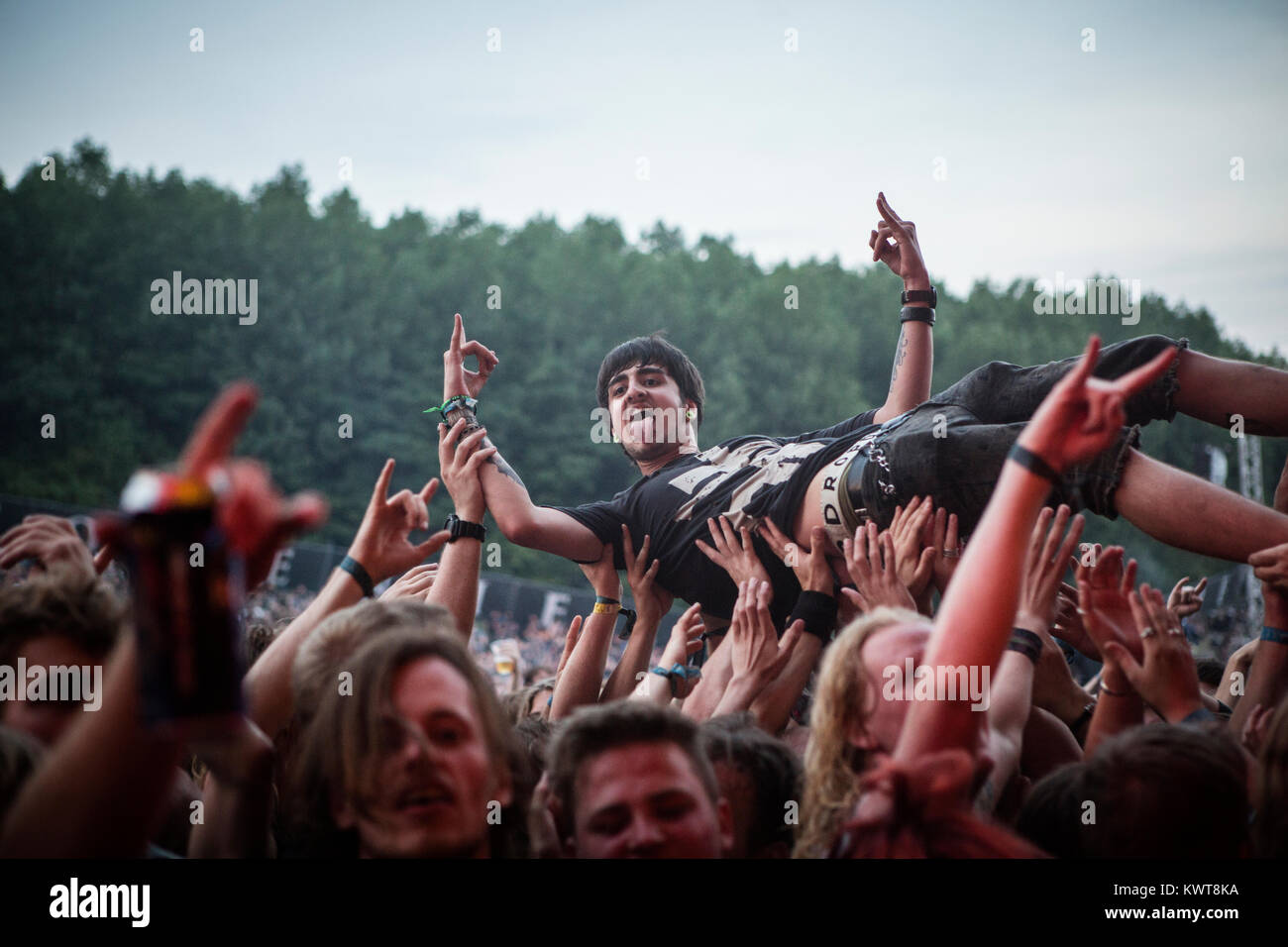 Music and heavy metal fans attend a live concert with the American ...