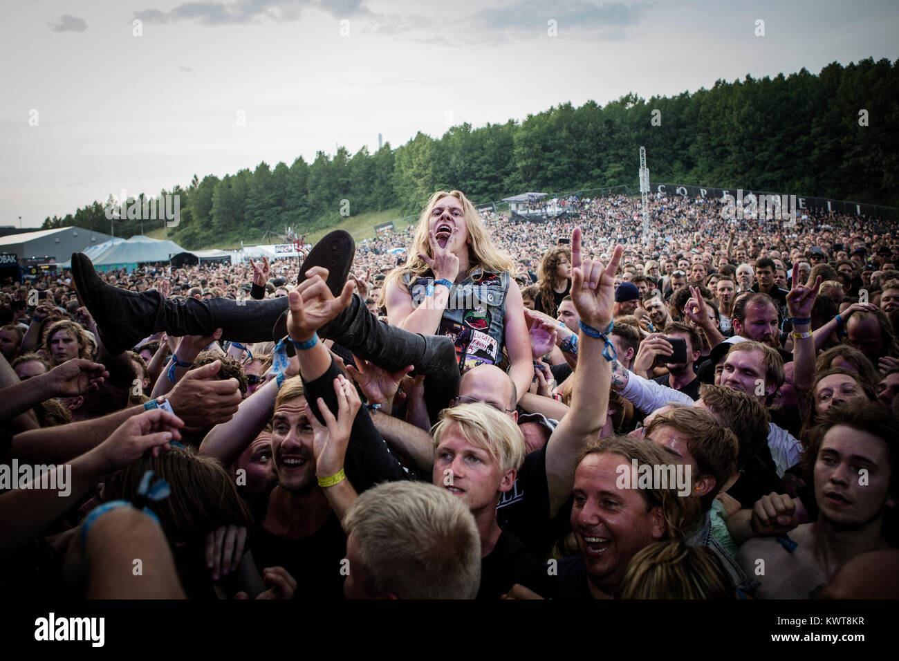 Music and heavy metal fans attend a live concert with the American ...