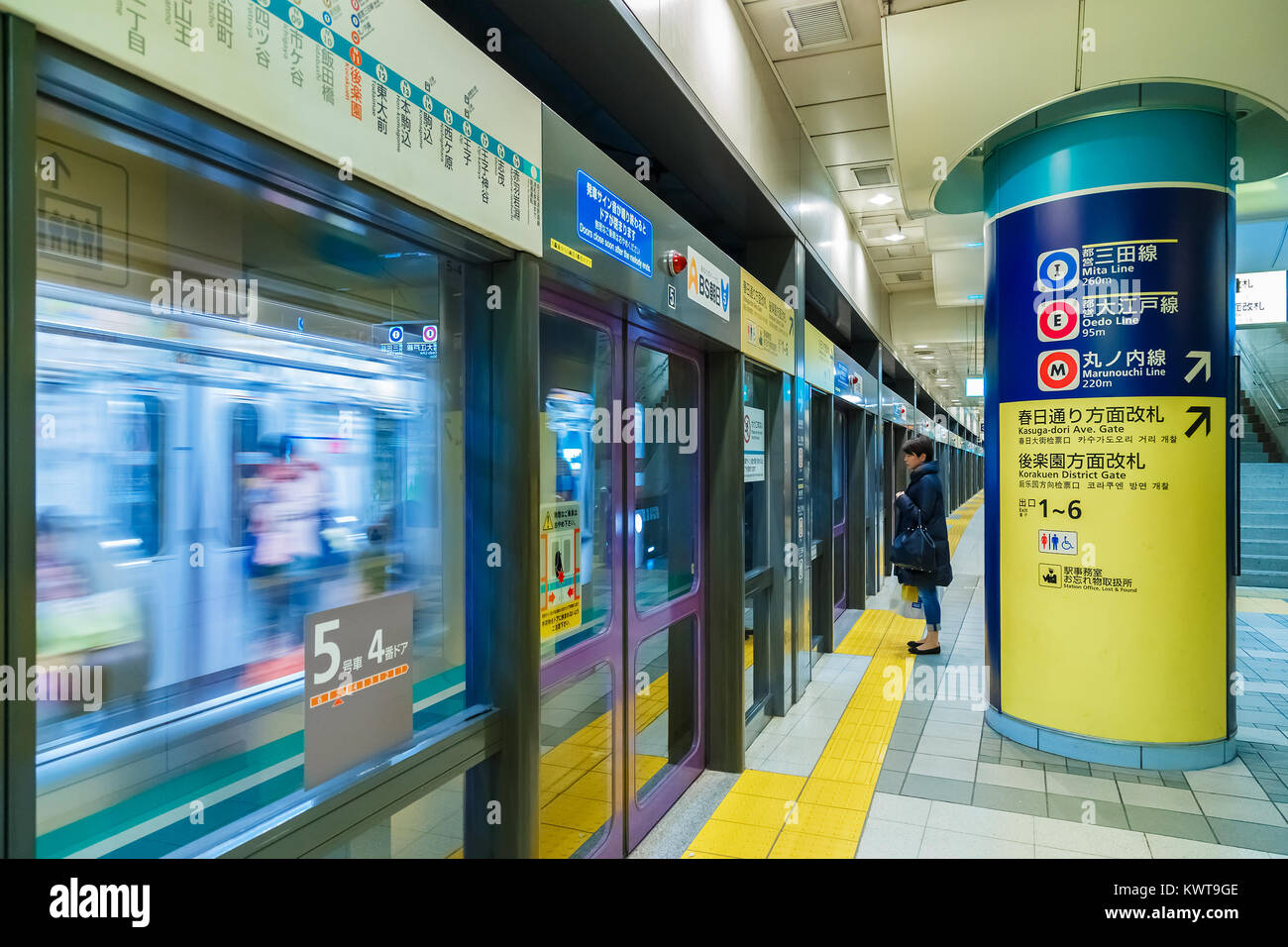 TOKYO, JAPAN - NOVEMBER 28 2015: Interior of a subway station and ...