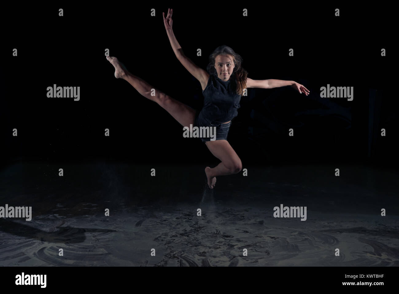 Young dancing girl in a jump Stock Photo - Alamy