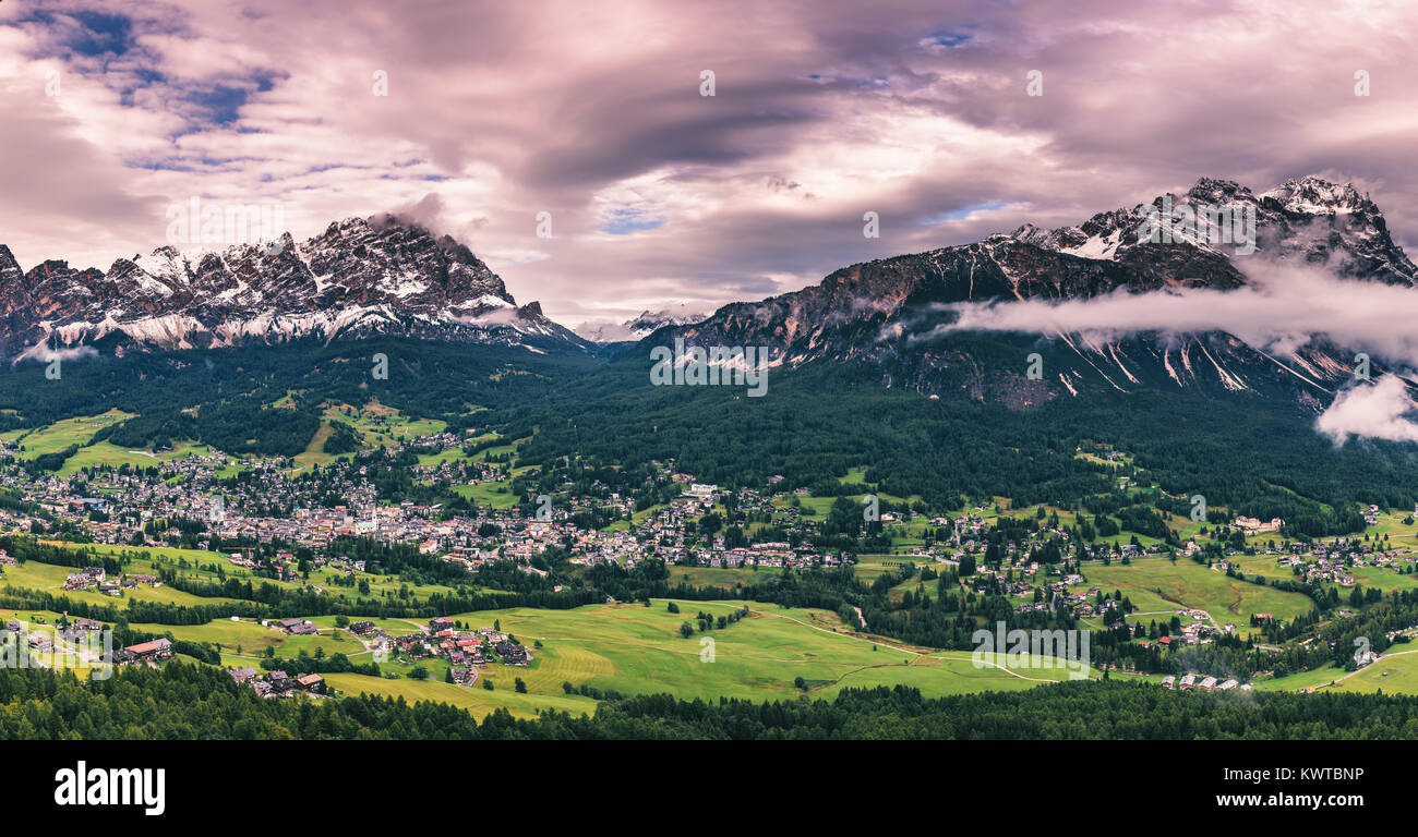 Cortina d'Ampezzo town panoramic view with alpine green landscape and ...