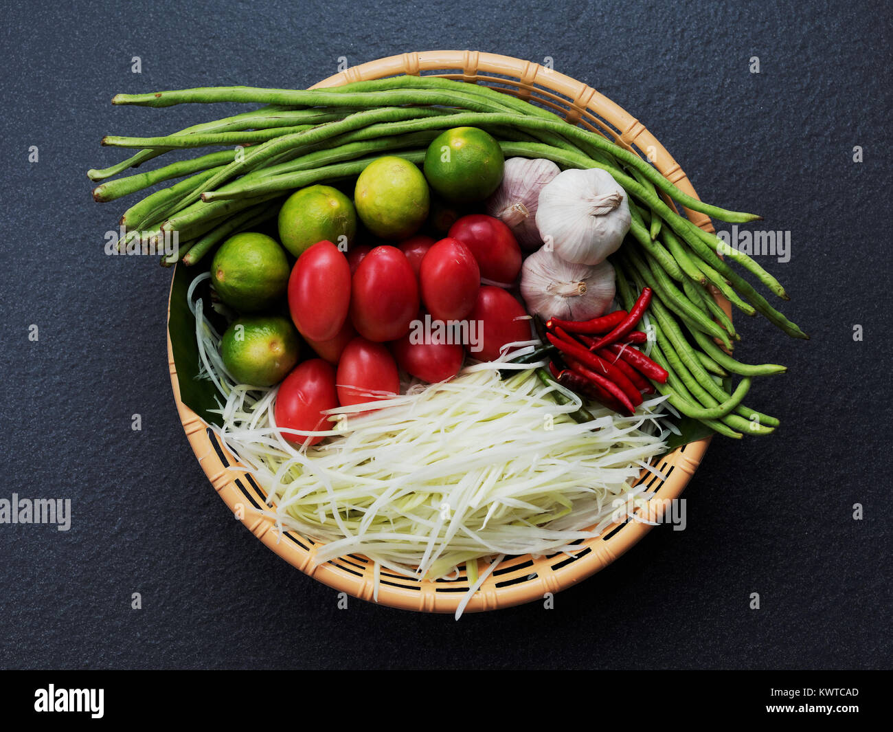 Mix ingredients of Thai green papaya Som tum salad composed of shredded ...