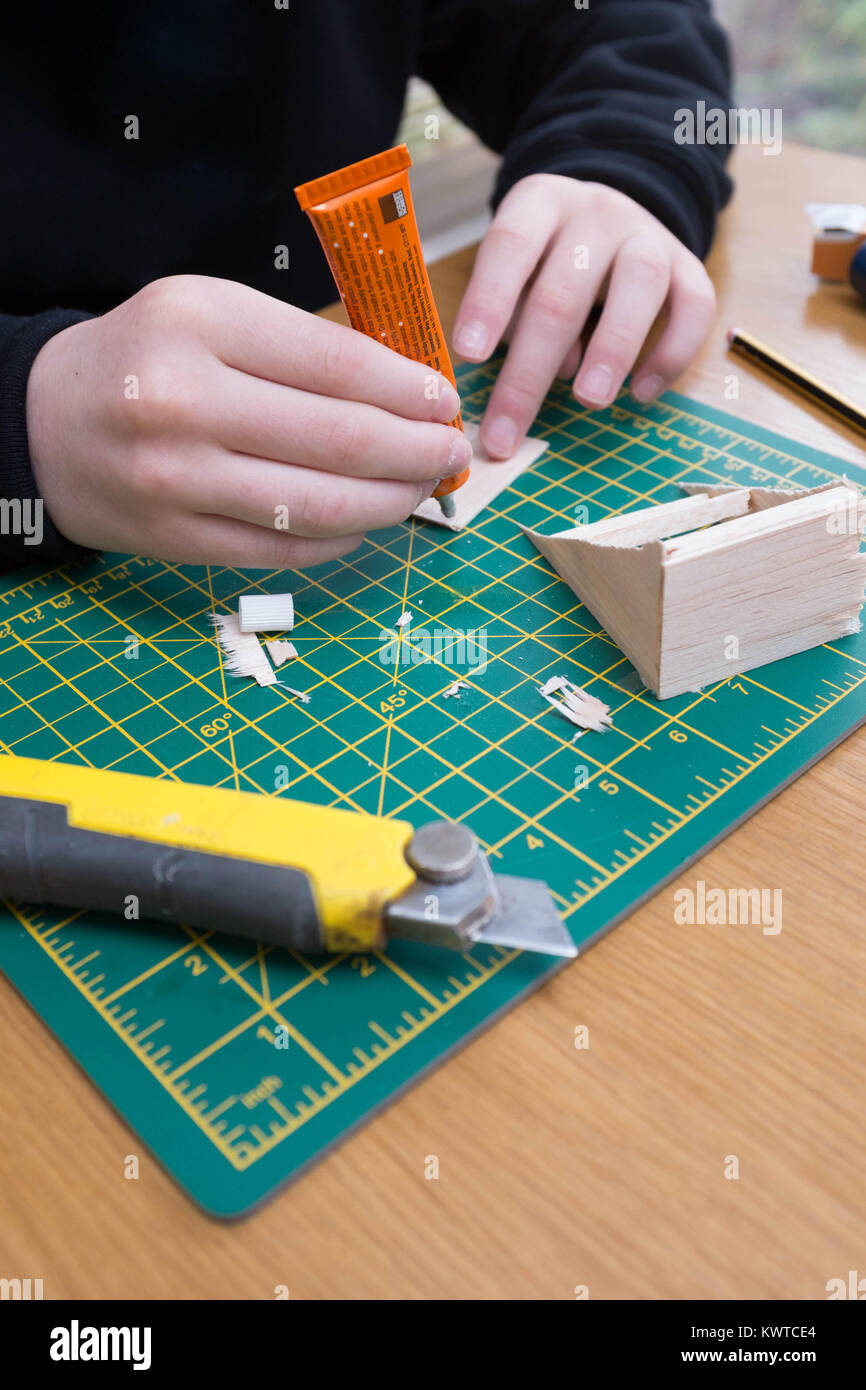 Boy making balsa wood model Stock Photo - Alamy