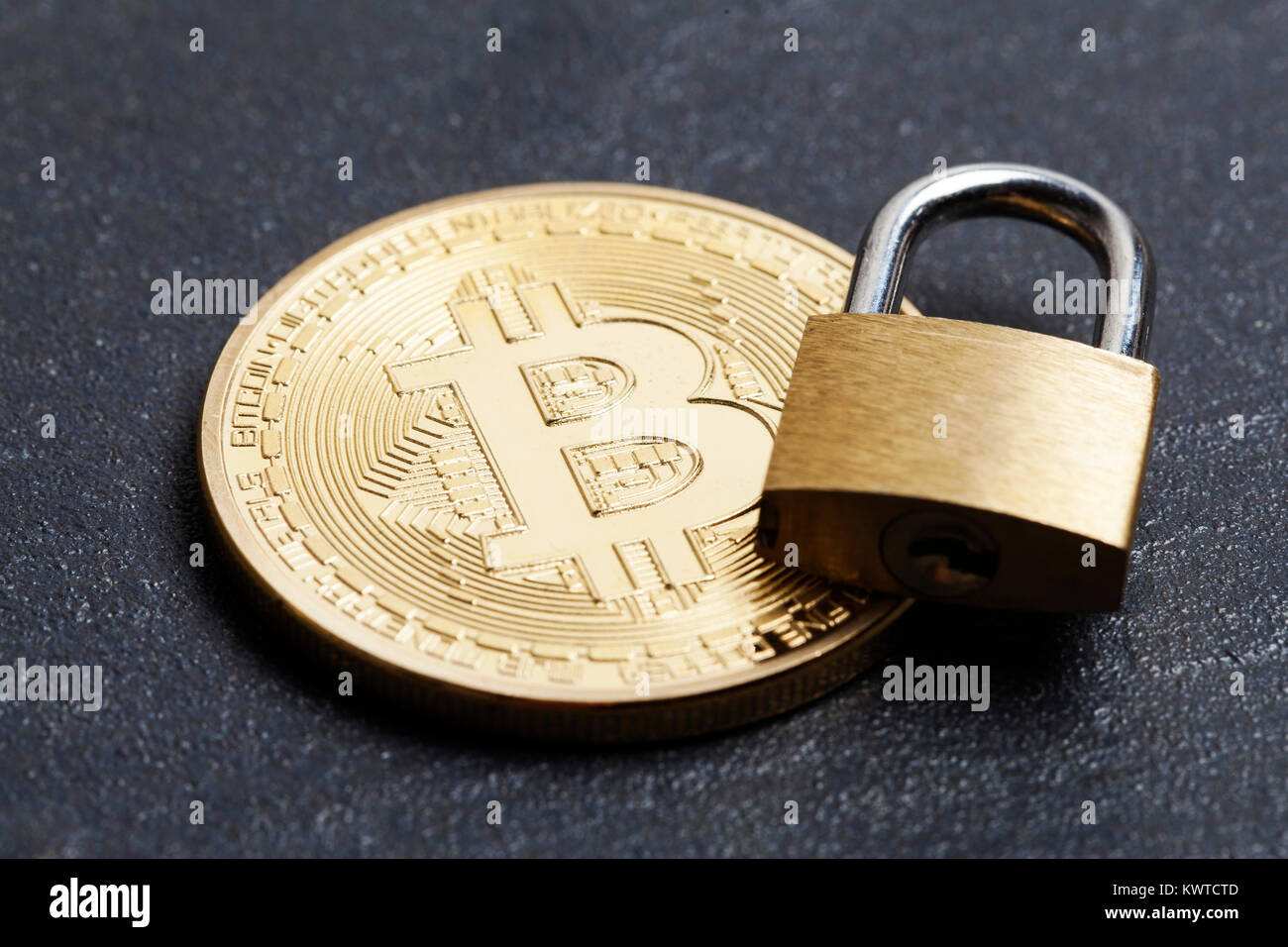 bitcoin security concept. Gold coin with padlock Stock Photo - Alamy