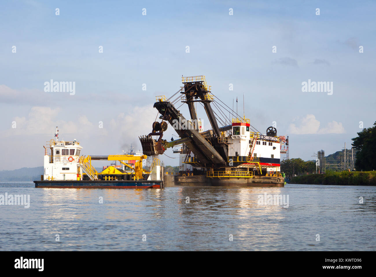 The large excavator Rialto M. Christensen is digging up soil and silt ...