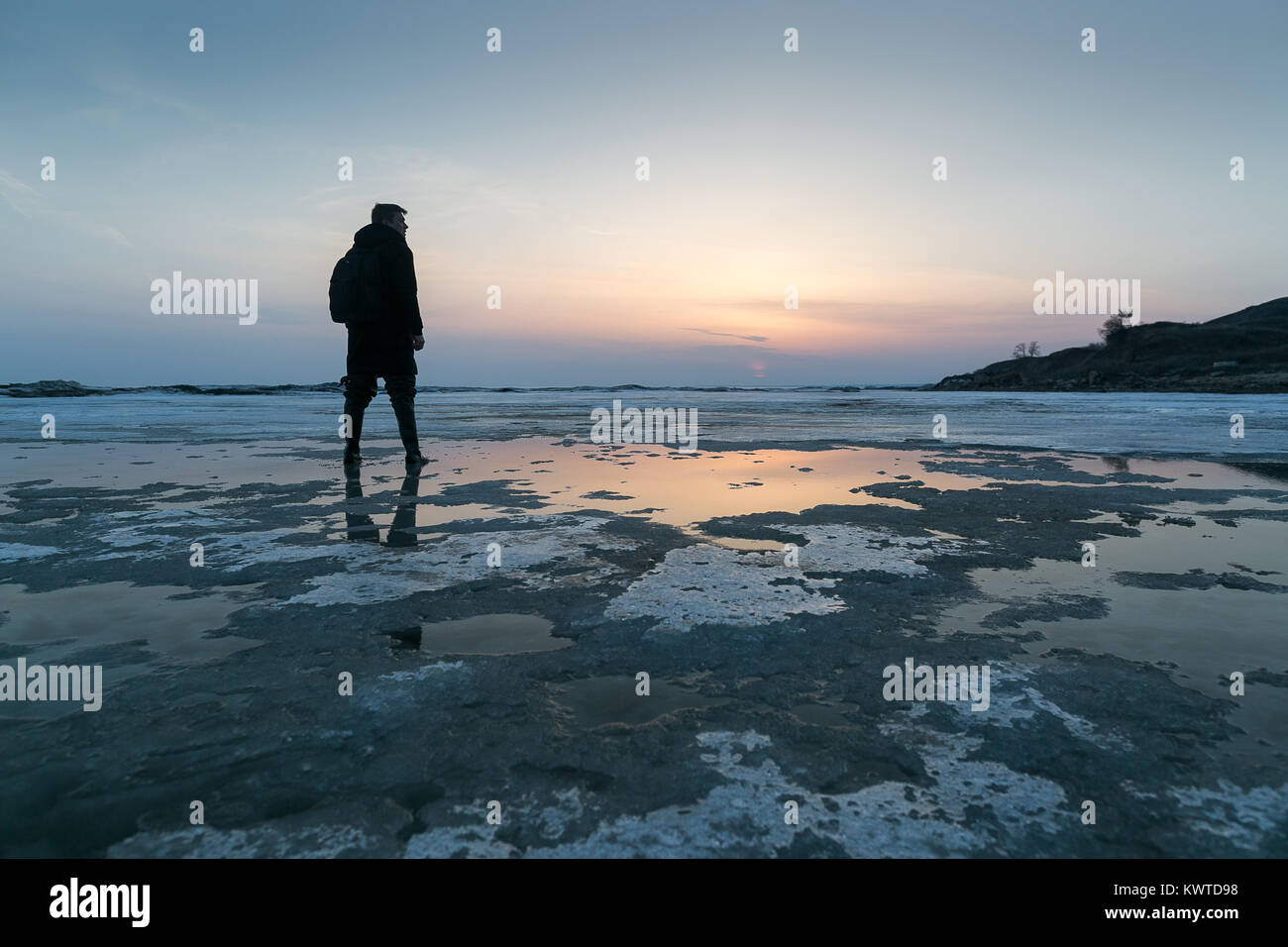 fishing, freedom, nature concept. lonely figure of fish man is standing ...