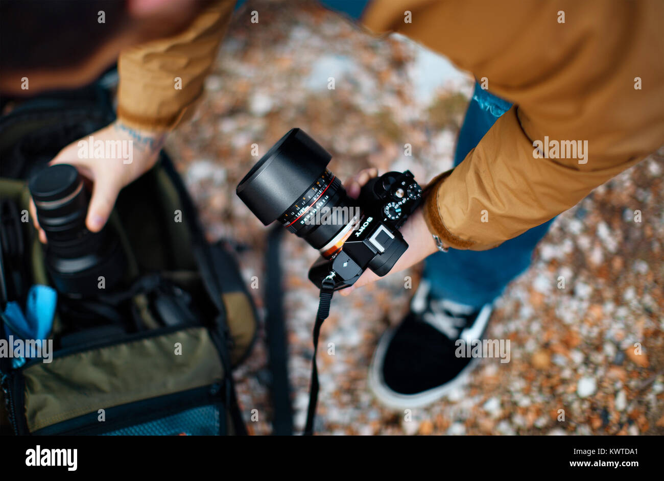 Man with Sony Alpha A7R on hand, photographer Stock Photo - Alamy