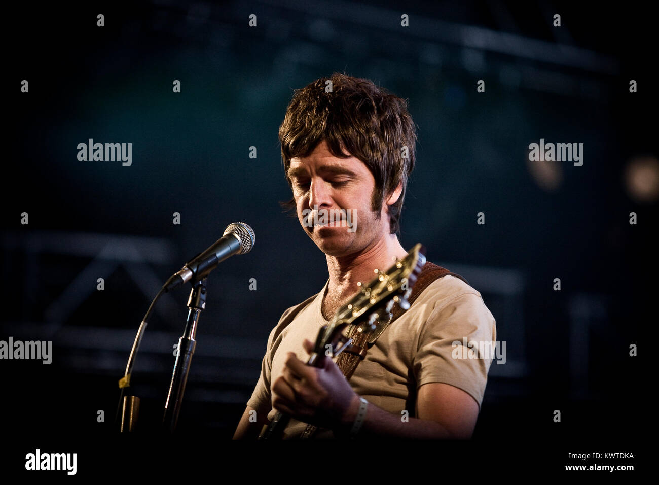 Lead singer and guitarist Noel Gallagher from Oasis live on stage at ...