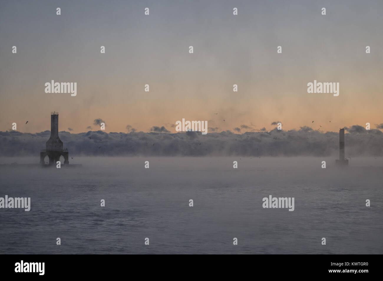 Port Washington Wisconsin Lighthouse on a cold winters sunrise Stock ...