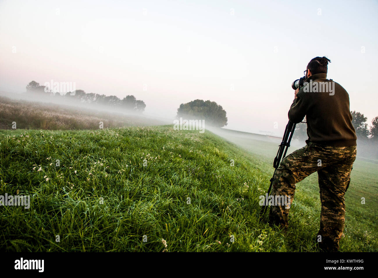 photographer in action Stock Photo - Alamy