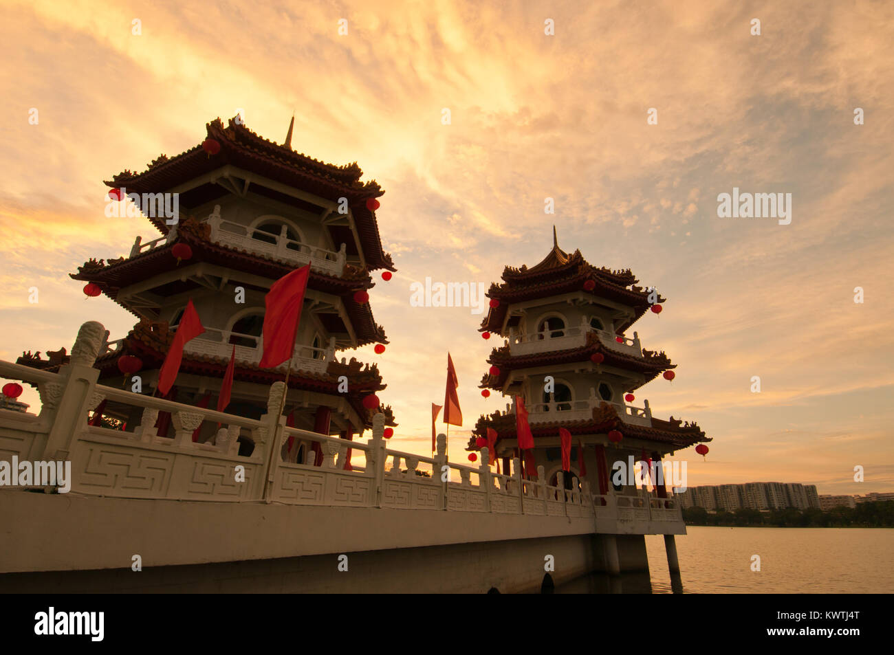 Beautiful golden sunset of Chinese style pagodas Stock Photo - Alamy