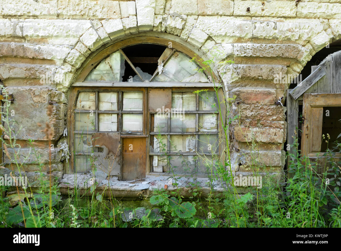 Smashed window of an old house Stock Photo - Alamy