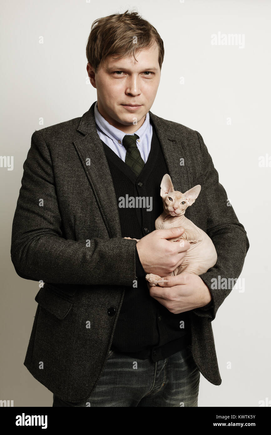 Man with cat, portrait Stock Photo - Alamy
