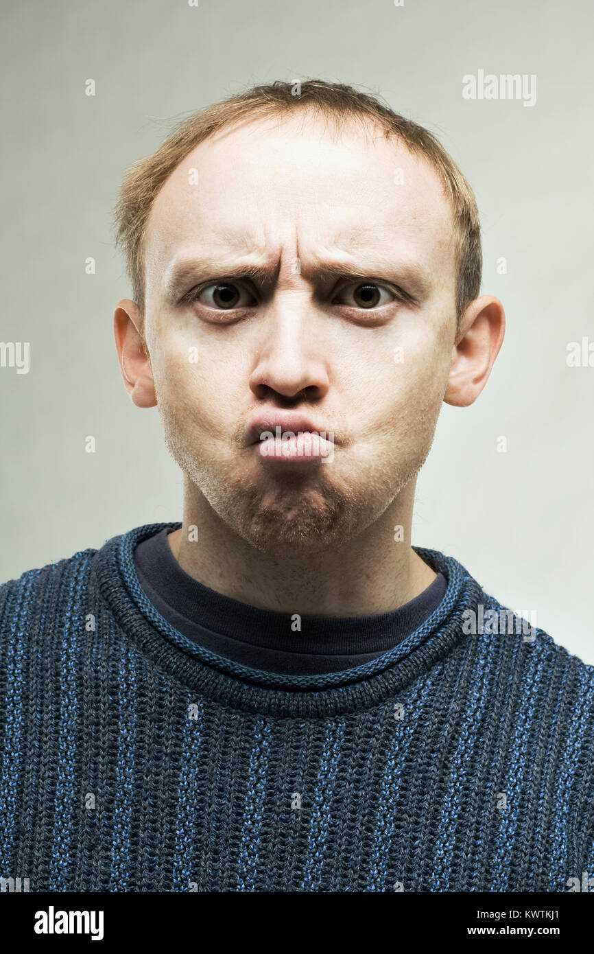 Young perplexed real man Stock Photo - Alamy