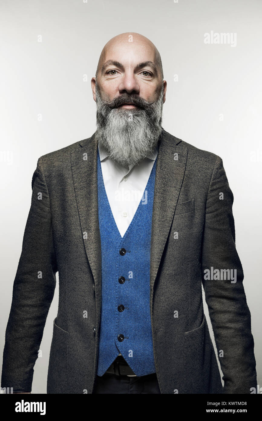 middle-aged man with beard, studio portrait Stock Photo - Alamy