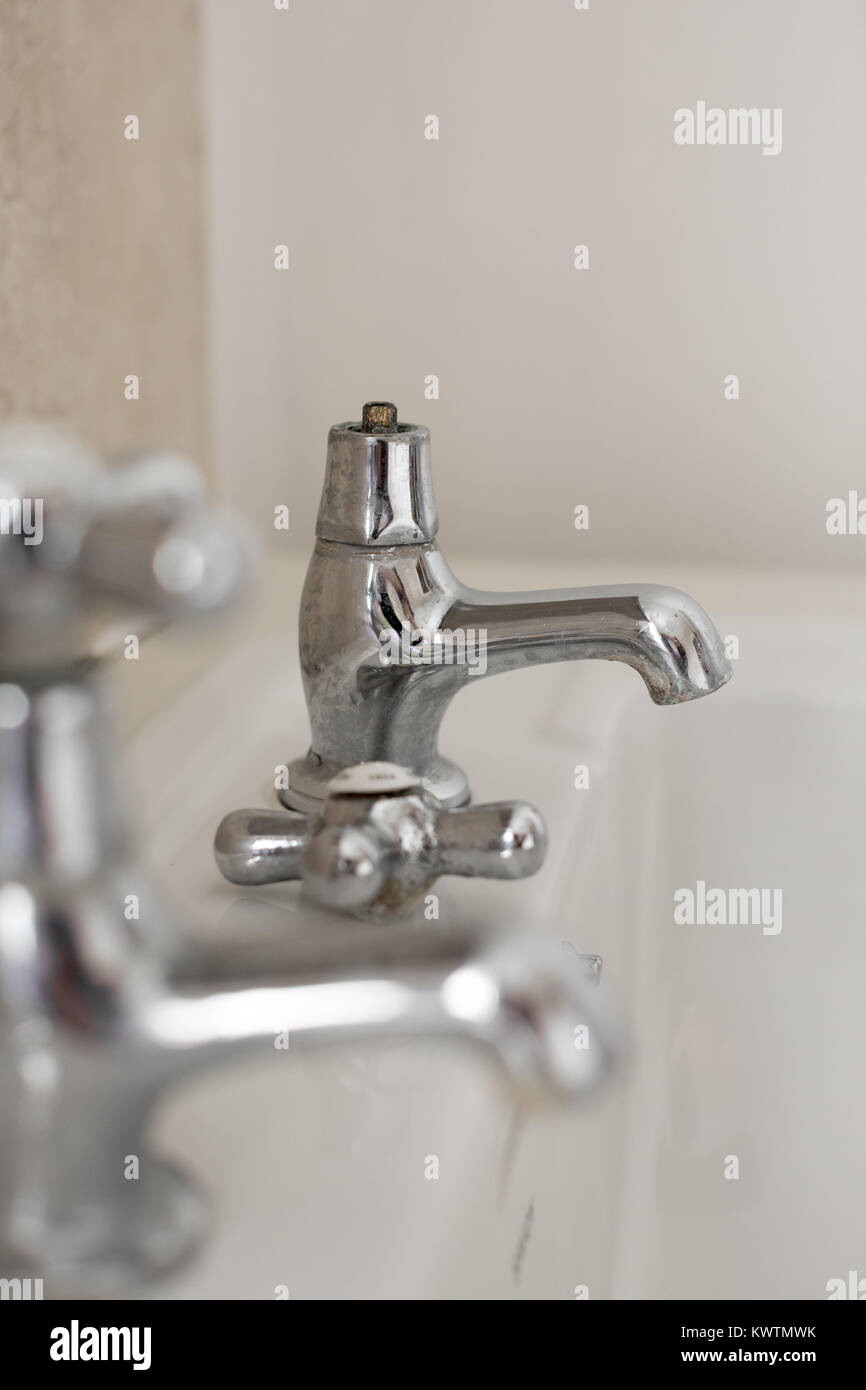 A broken bathroom tap Stock Photo - Alamy