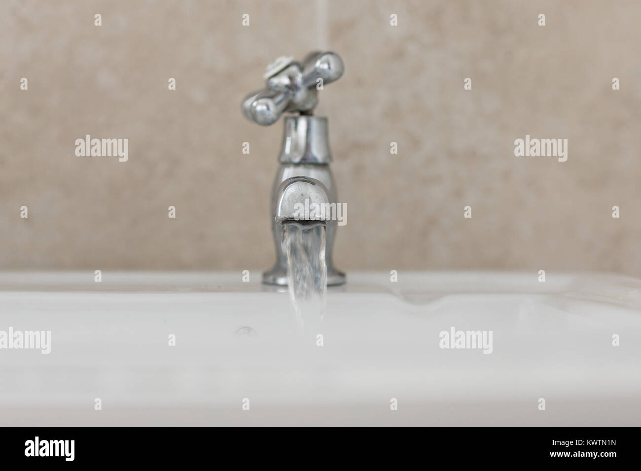 A broken bathroom tap Stock Photo - Alamy