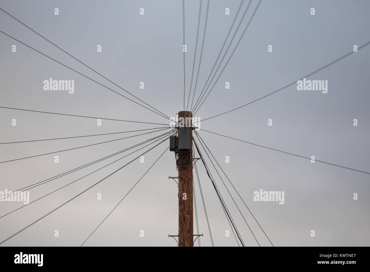 Wires connected telephone pole hi-res stock photography and images - Alamy