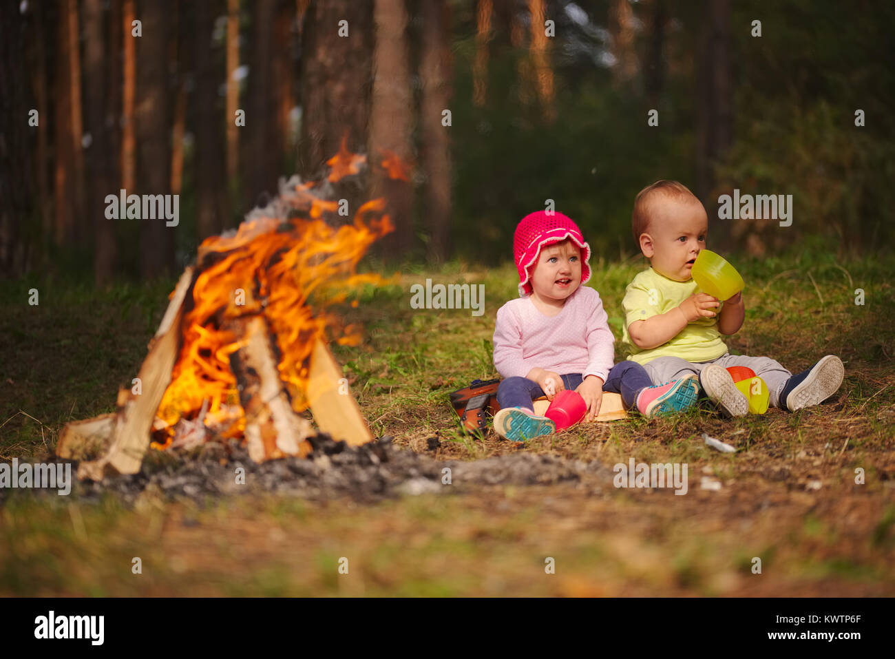 photo of happy children hiking in the forest Stock Photo - Alamy