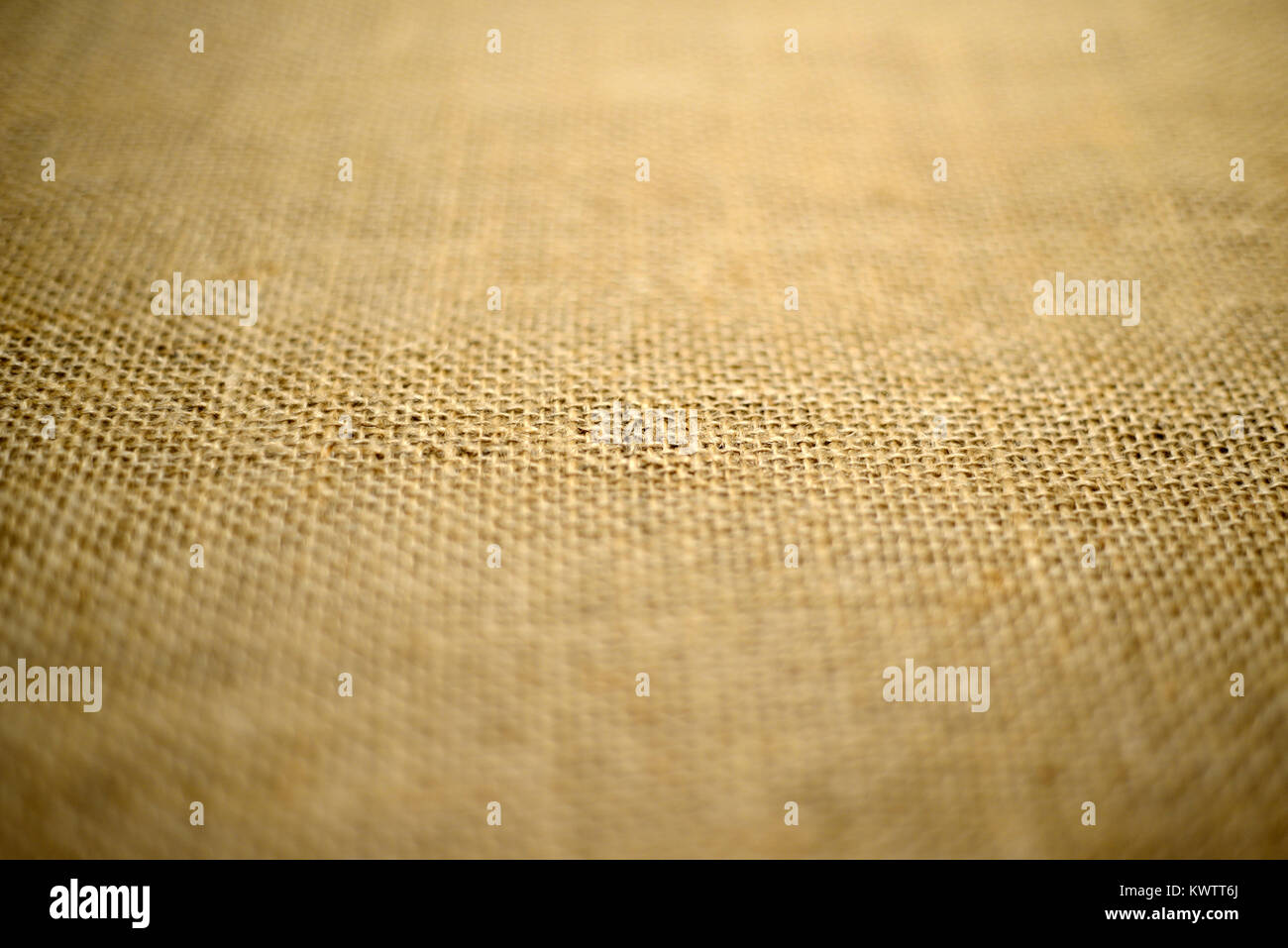 vintage textured background of coarse burlap, small depth of field ...