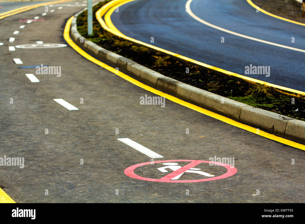 End of walk way sign on the asphalt road surface Stock Photo - Alamy