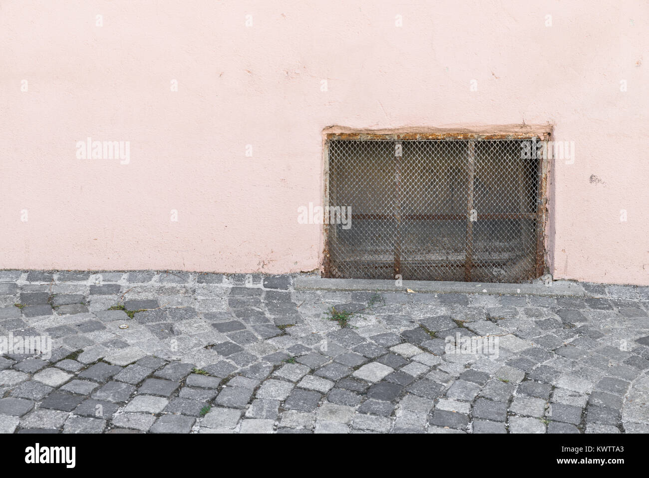 Old rusty Cellar window with iron grating Stock Photo - Alamy