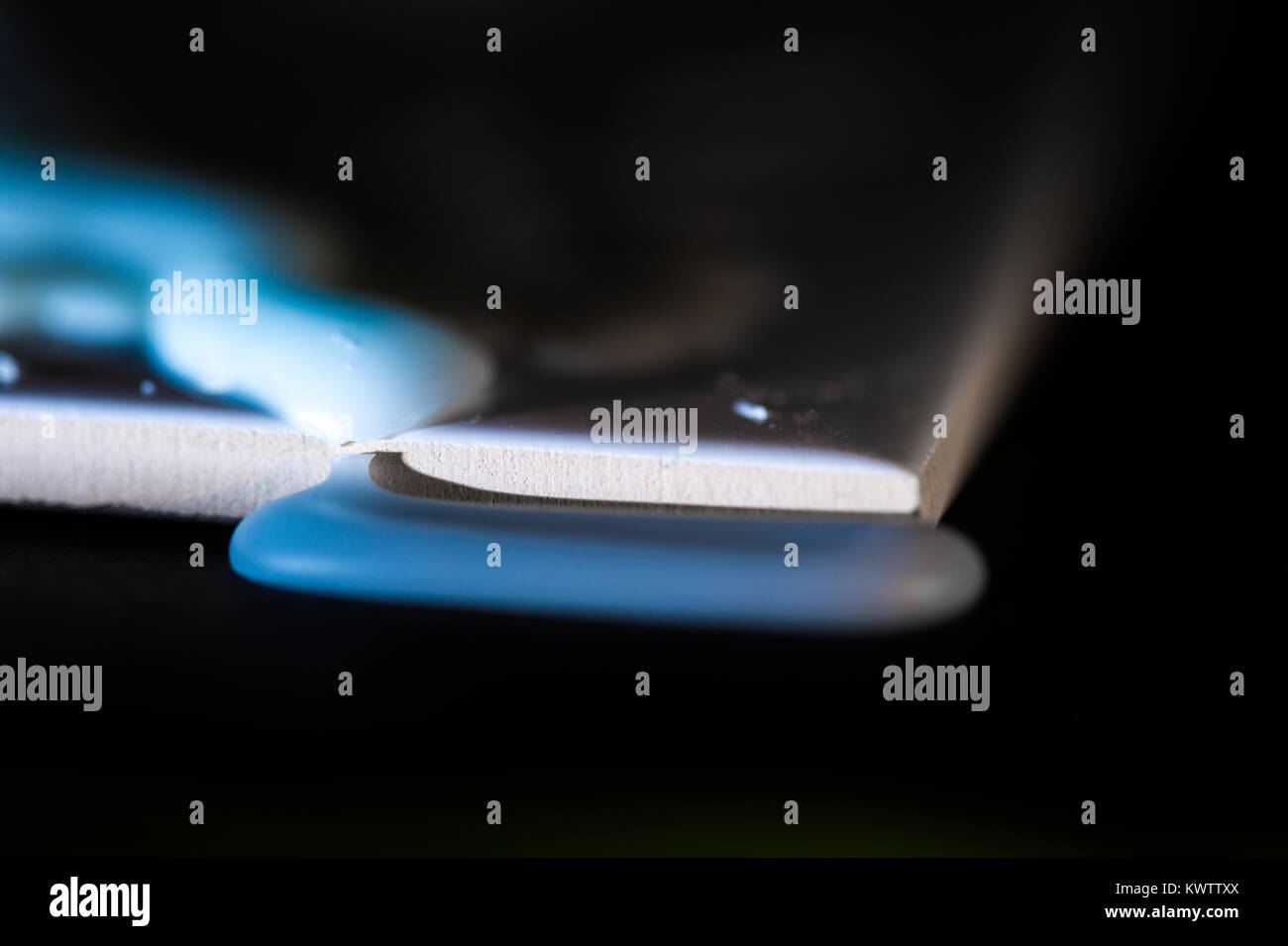 Melted wax dripping and forming a shape Stock Photo - Alamy