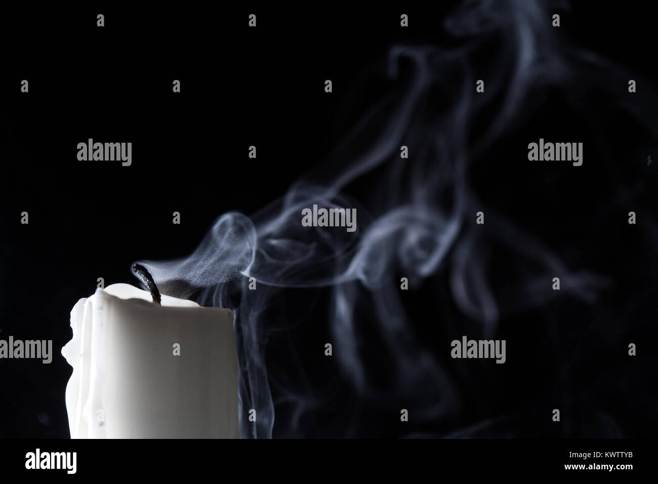 Smoke coming from extinguished wick on a black background Stock Photo ...