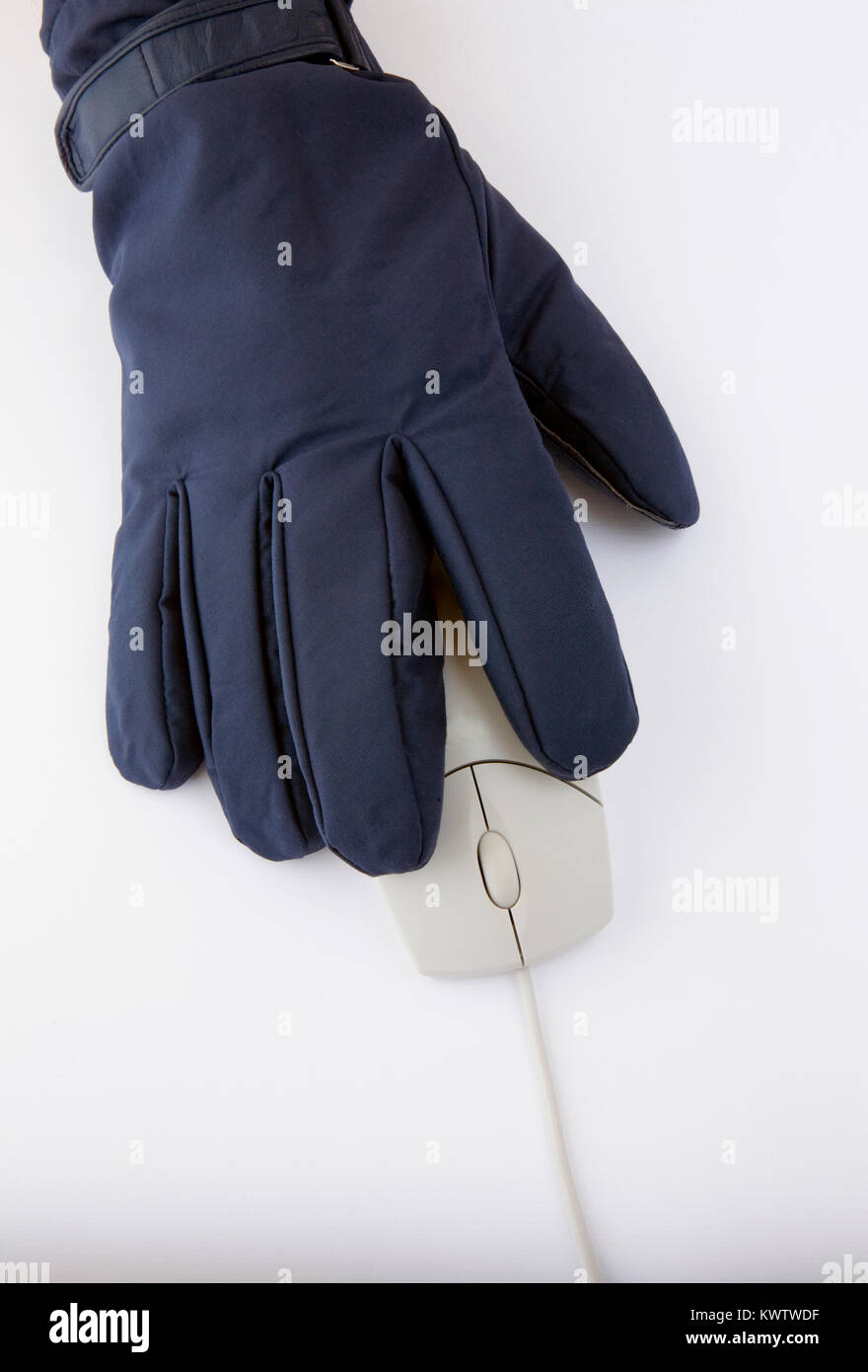 Older man's hand in glove using computer mouse pointing device Stock ...