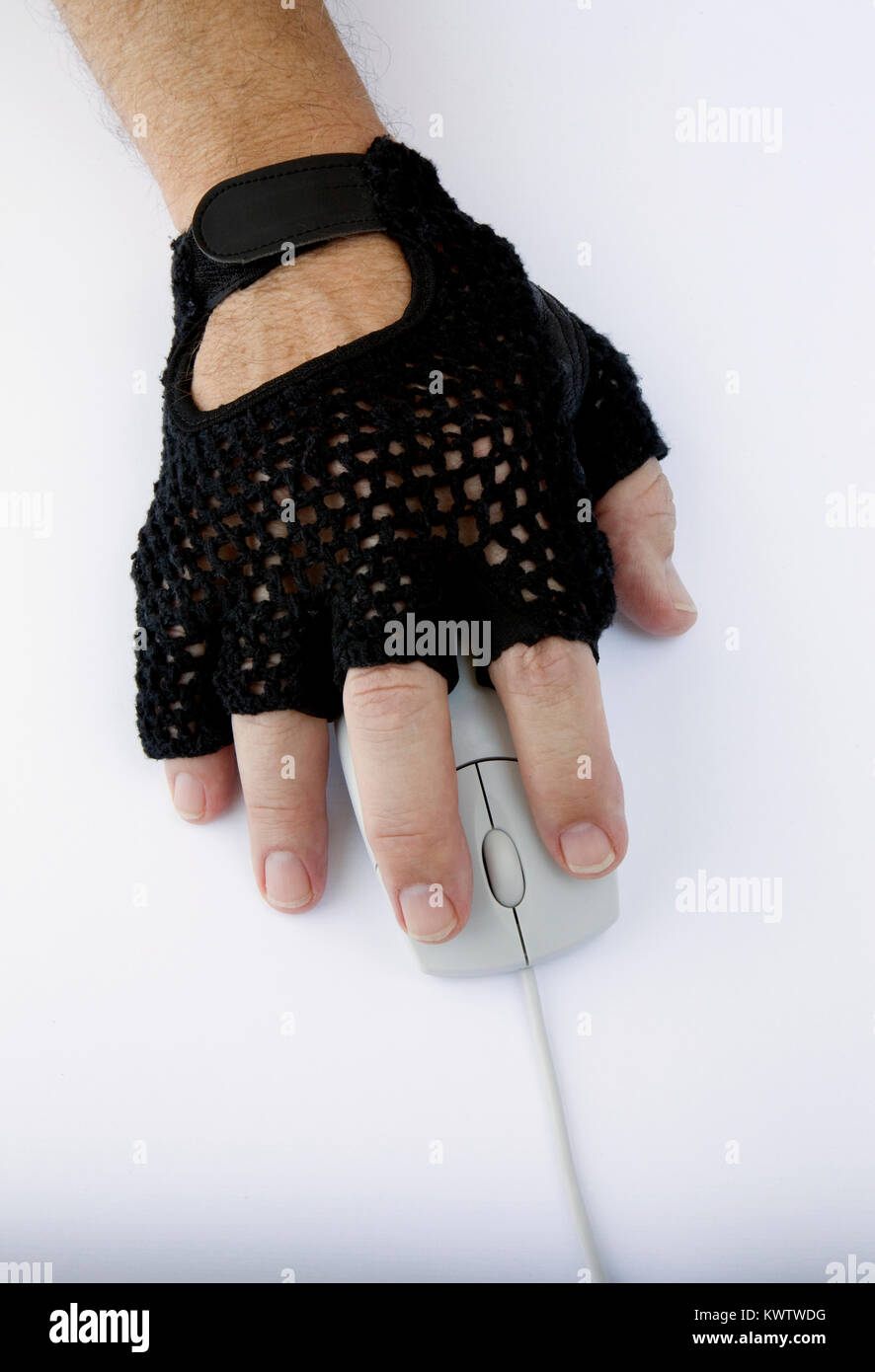 Older man's hand in glove using computer mouse pointing device Stock ...