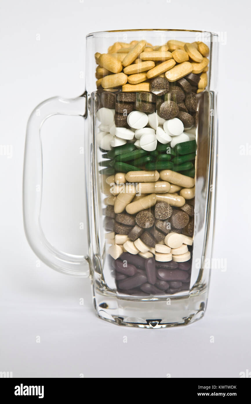 Pill popping metaphor hi-res stock photography and images - Alamy