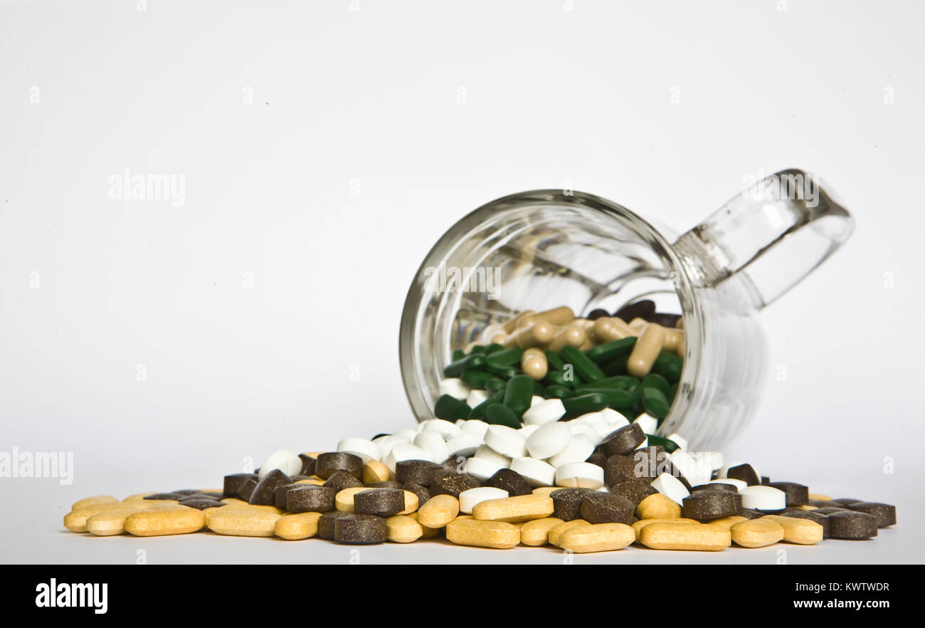 beer mug of drugs pills Stock Photo - Alamy